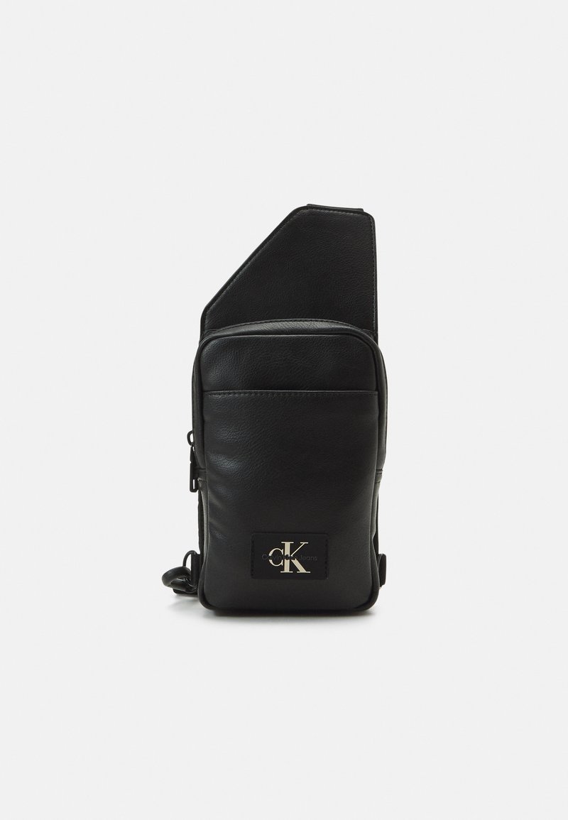 Calvin Klein Jeans TAGGED ANGLED PHONE CROSSBOY UNISEX - Phone case ...