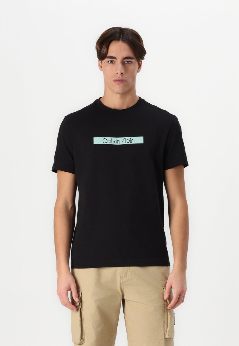 Calvin Klein CUT OUT SHADOW LOGO - Print T-shirt - black - Zalando