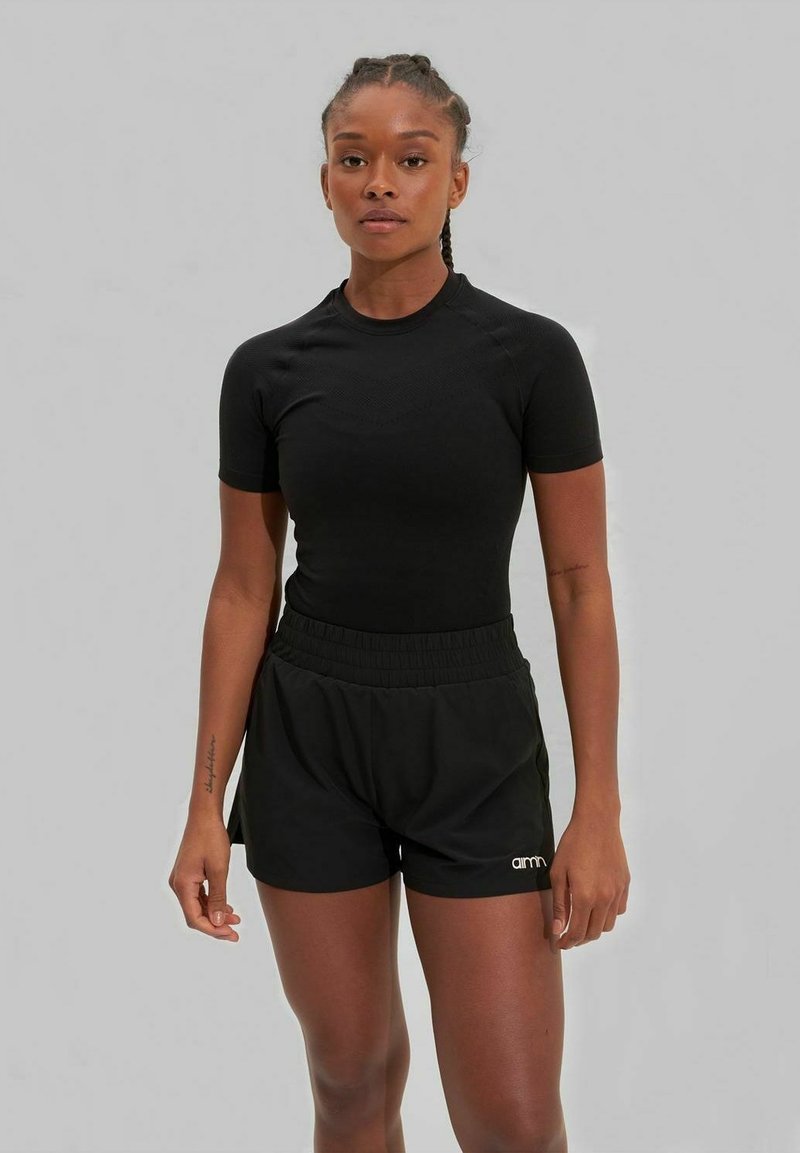 aim’n® SOFT SEAMLESS - T-Shirt basic - black/schwarz - Zalando.at