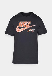 Nike Sportswear TEE SOLE RALLY - Print T-shirt - black - Zalando.co.uk