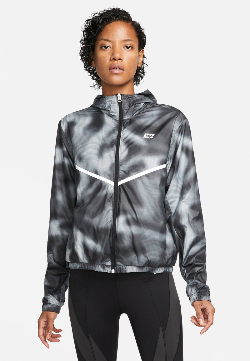 Nike Performance W NK RPL IC WVN JKT CE AOP - Running jacket - black ...