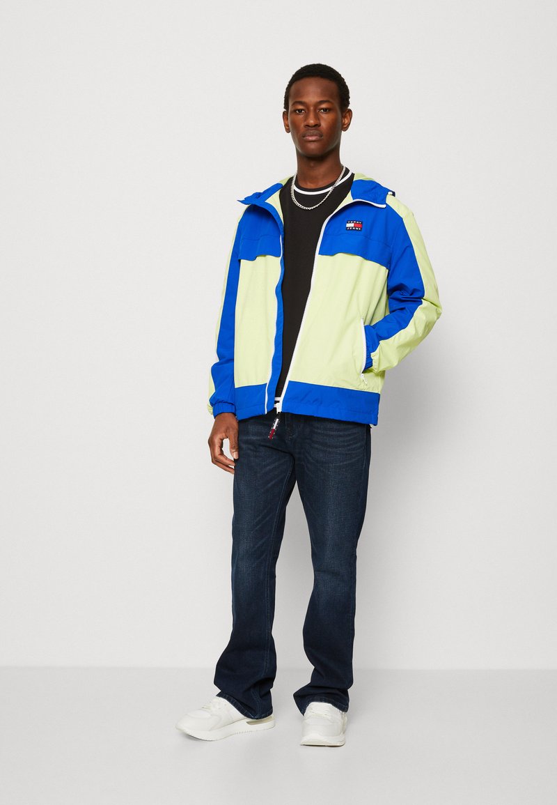 Tommy Jeans CHICAGO UNISEX - Light jacket - ultra blue/light citrus ...