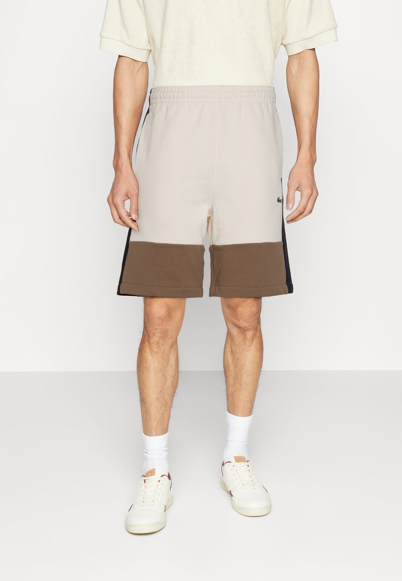 Lacoste ELEVATED COLORBLOCK - Tracksuit bottoms - lapland/cookie/off ...