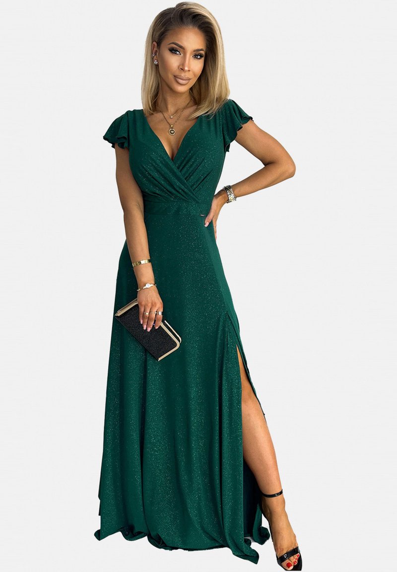 Chelsea Clark GLOSSY WITH A NECKLINE AND A SLIT ON THE LEG ...