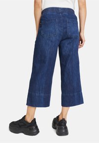 Cartoon CULOTTE MIT EINGRIFFTASCHEN - Flared Jeans - dark blue denim/blau - Zalando.de