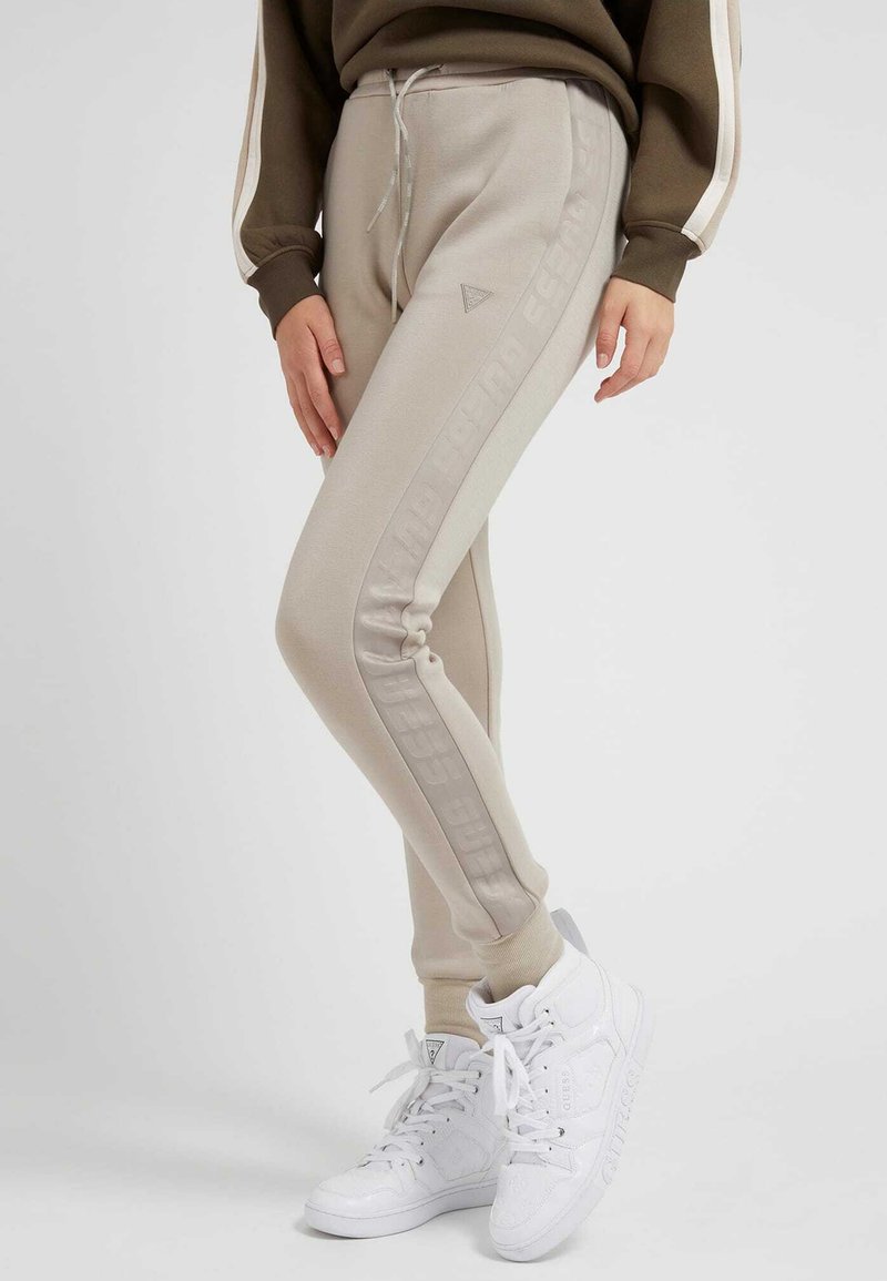 Guess Logo Band Jogginghose Beige Zalando At