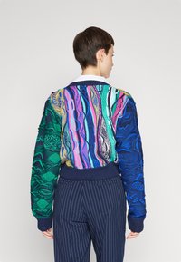 Carlo Colucci Strickjacke Damen