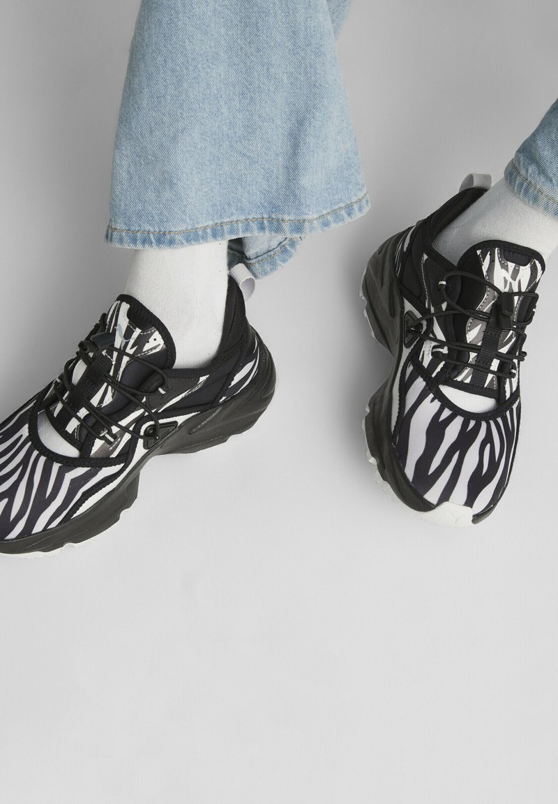 Puma ORKID ANIMAL - Sneaker low - feather gray black/schwarz - Zalando.at