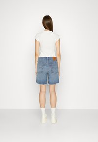 Levi's® 501® MID THIGH SHORTS - Jeansshorts - odeon/blå denim - Zalando.se
