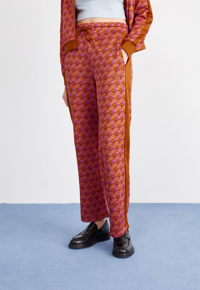 Puma TRACK PANTS - Tracksuit bottoms - teak/tan - Zalando.ie