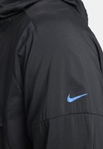 Nike Performance RUN ENERGY WINDRUNNER - Laufjacke - black black hyper royal/schwarz - Zalando.de