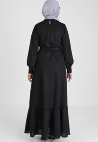 Modanisa CREW NECK - MODEST - TAVIN - Maxikleid - black/schwarz ...