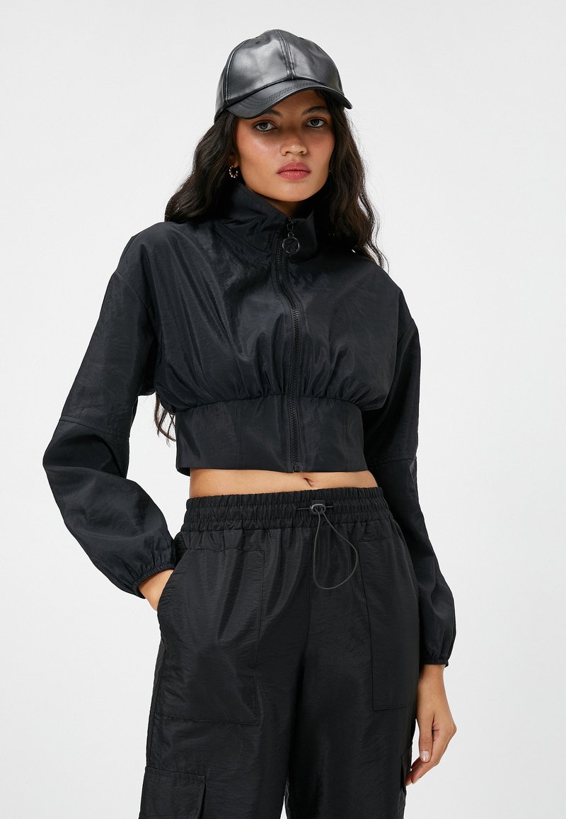 Koton HIGH RISE ELASTIC WAIST CROP PARACHUTE - Giacca leggera - black ...