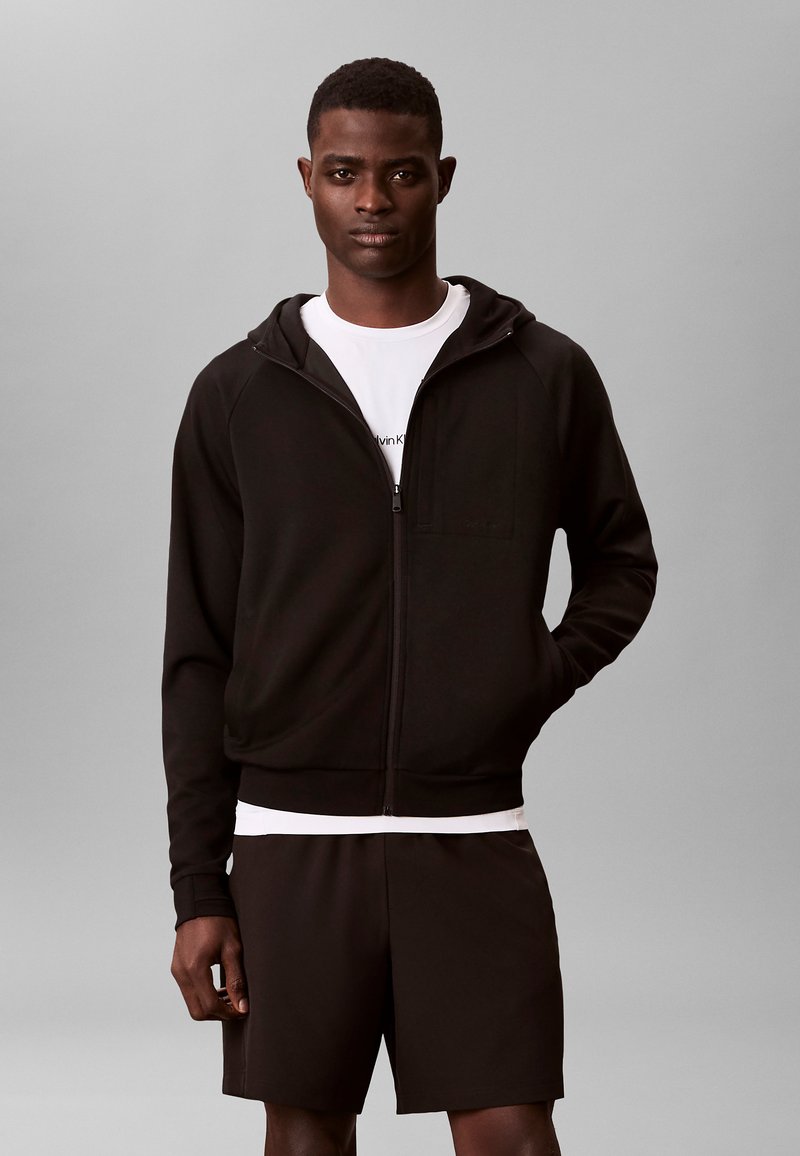 Calvin Klein TRAVEL HOODIE - Sudadera con cremallera - black/negro ...