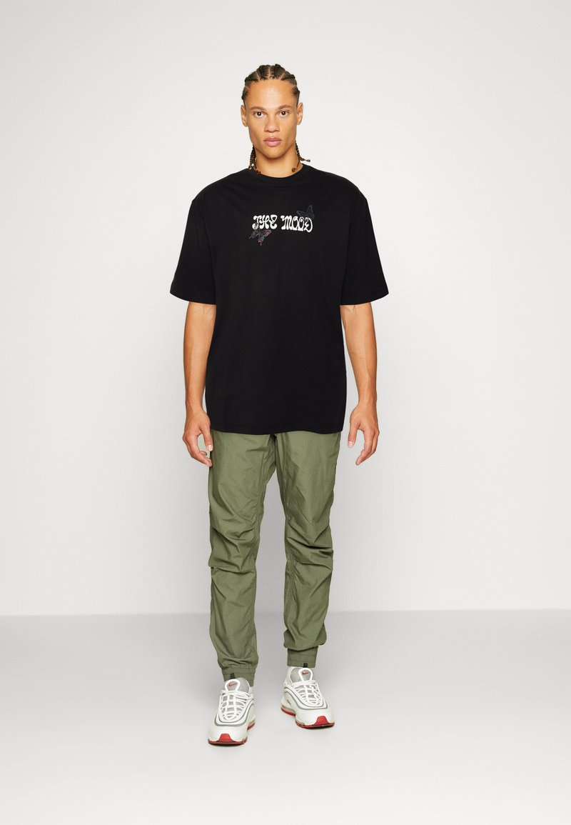 YOURTURN UNISEX - T-shirt con stampa - black/nero - Zalando.it