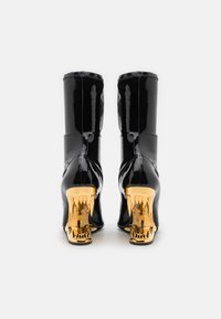 GCDS MORSO BOOTS UNISEX - Kozaki - black/czarny - Zalando.pl