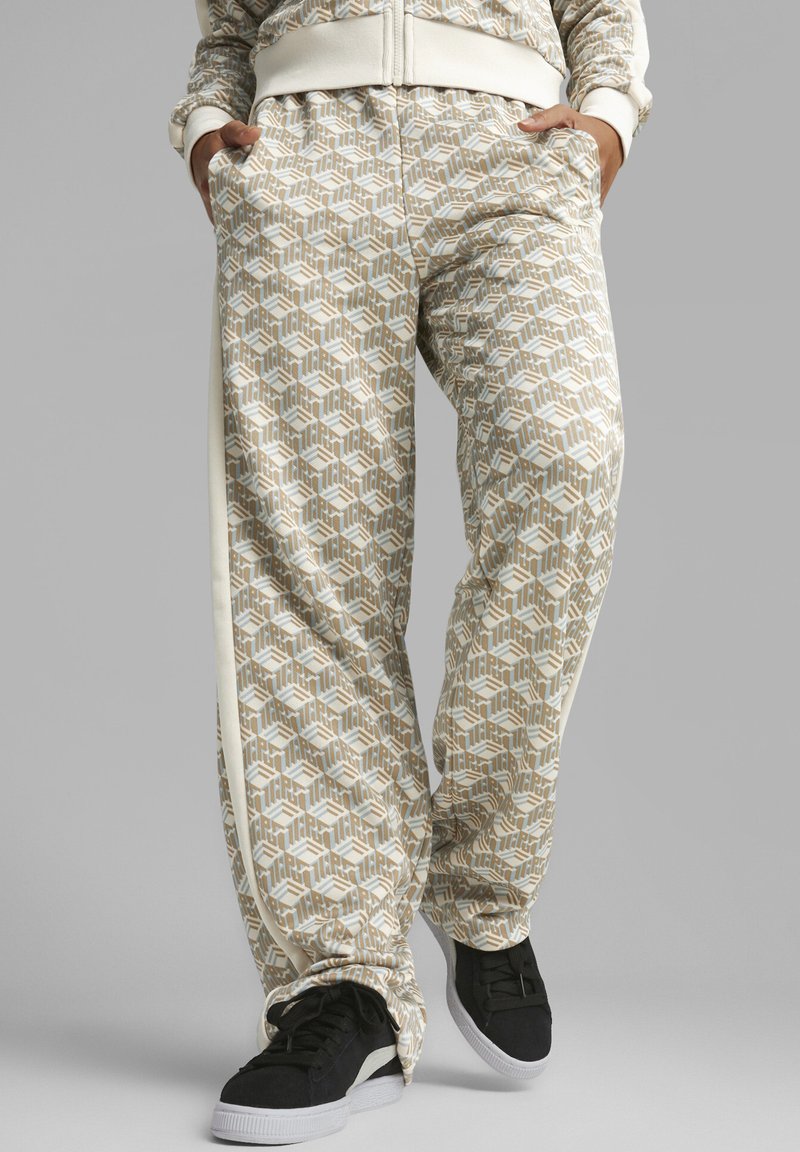 Puma Tracksuit bottoms - prairie tan aop/beige - Zalando