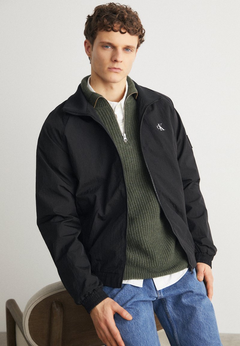 Calvin Klein Jeans UNPADDED HARRINGTON - Kevyt takki - black/musta ...