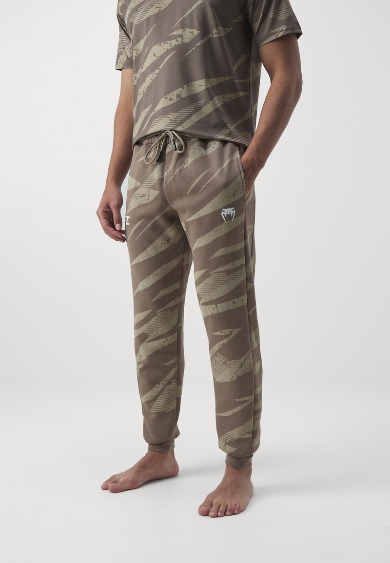 Venum UFC FIGHT WEEK 3.0 JOGGERS - Tracksuit bottoms - desert/khaki ...