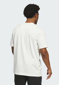 adidas Performance DAWG IN EM T - Print T-shirt - off white/off-white ...