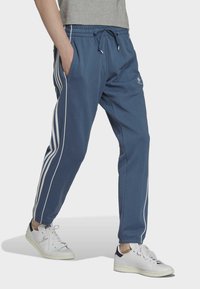 adidas Originals ESS SWTP - Pantalones deportivos - blue/gris - Zalando.es