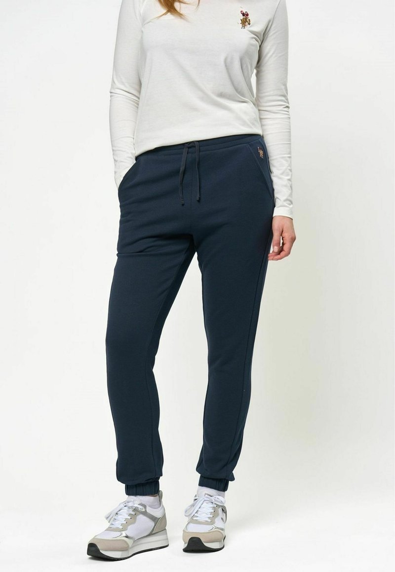 U.S. Polo Assn. GERDA - Tracksuit bottoms - dark sapphire/dark blue ...