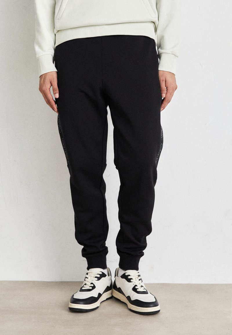 Calvin Klein Logo Tape Jogger Jogginghose Black Schwarz Zalando At