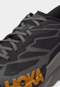 HOKA MAFATE X - Trail running shoes - black/cement/black - Zalando.co.uk