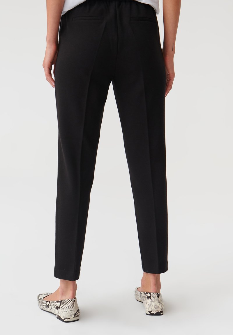 TATUUM IWONE - Kalhoty - black/černá - Zalando.cz