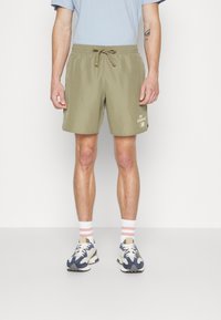 New Balance NB ESSENTIALS - Shorts - olive/oliv - Zalando.de