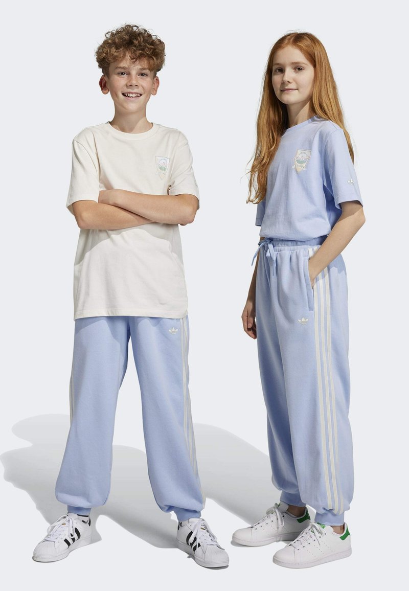 adidas Originals GRAPHIC PRINT - Tracksuit bottoms - blue dawn/blue ...