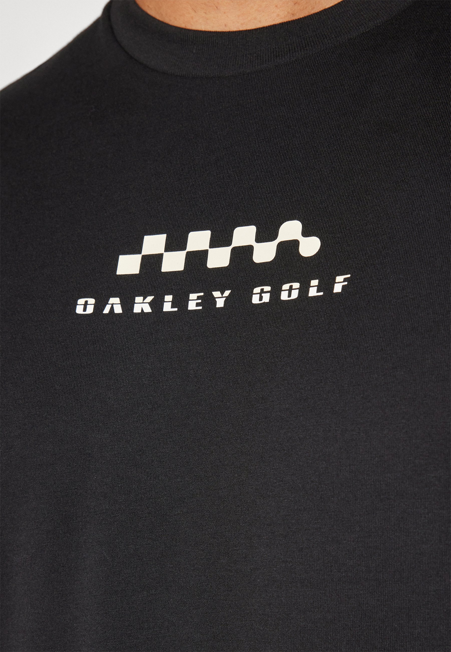 Oakley golf shirts store