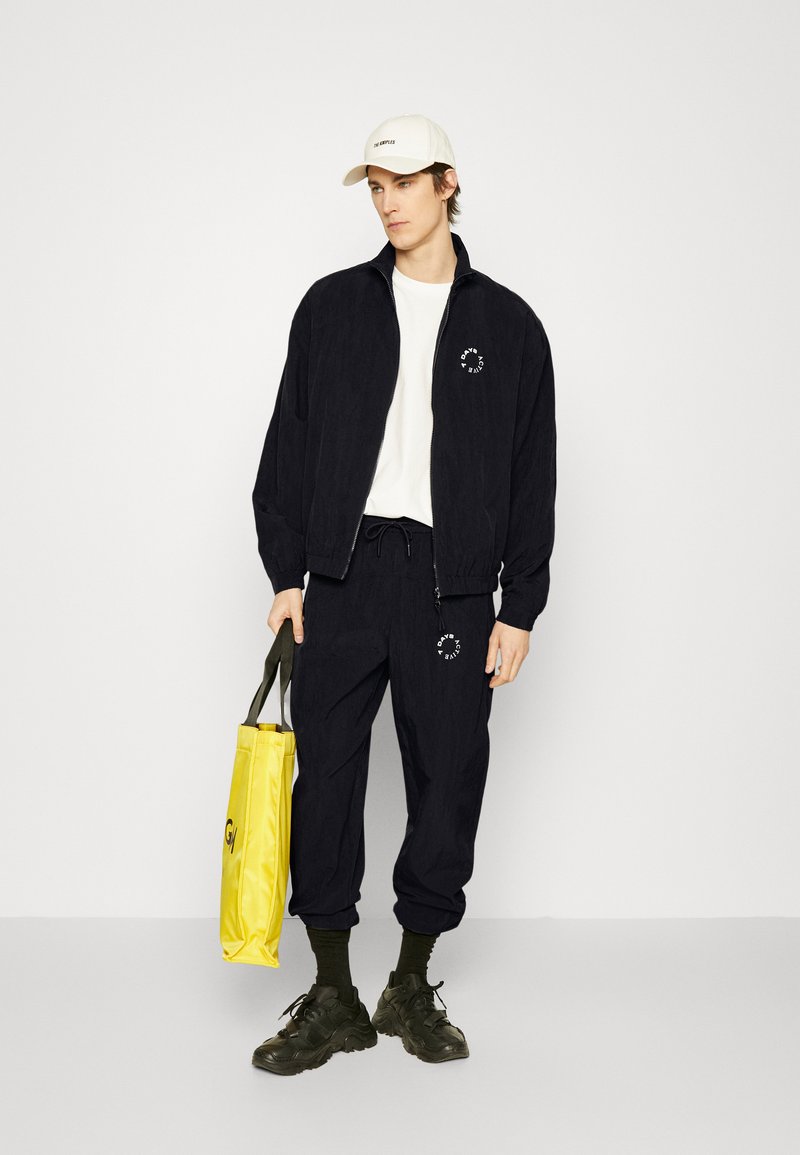 7 DAYS Active TRACK JACKET UNISEX - Trainingsjacke - black/schwarz - Zalando.ch