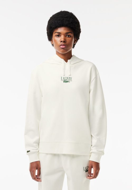 Lacoste Verryttelyhousut - blanc/luonnonvalkoinen - Zalando.fi