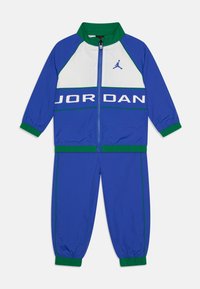 Jordan WIND BREAKER PIPING UNISEX SET - Training jacket - racer blue ...