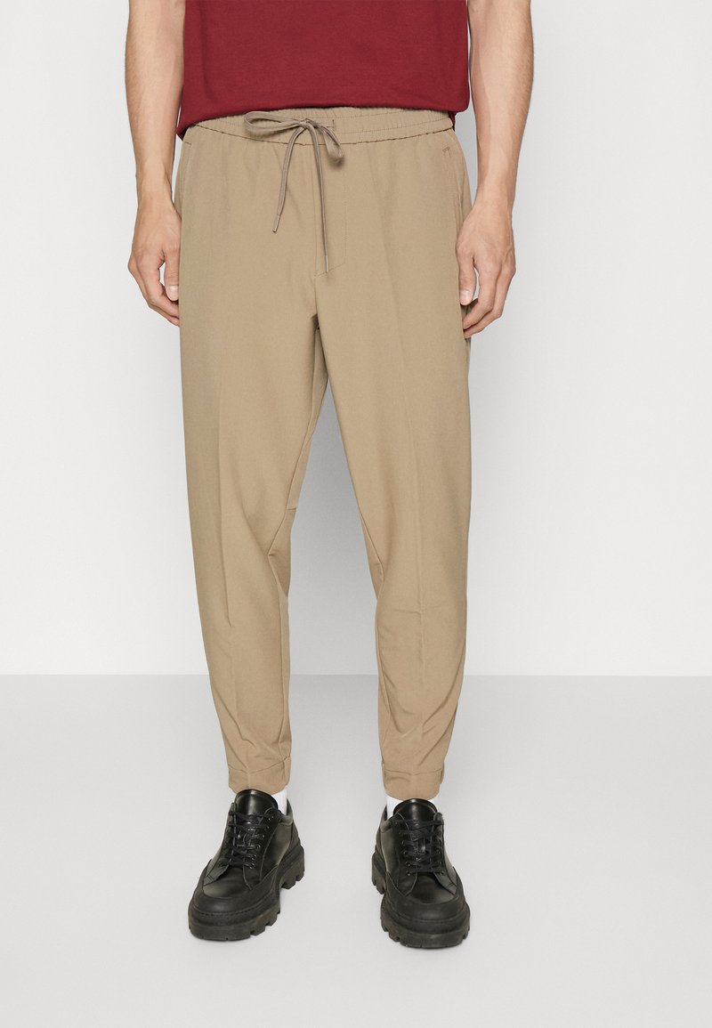 BOSS FLEX - Tracksuit bottoms - sand/light brown/taupe - Zalando