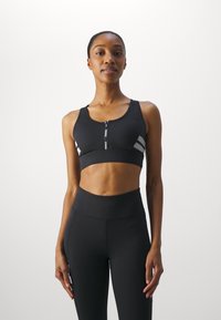 Stronger AMAZE - Sport-BH mit starker Stützkraft - black/schwarz ...