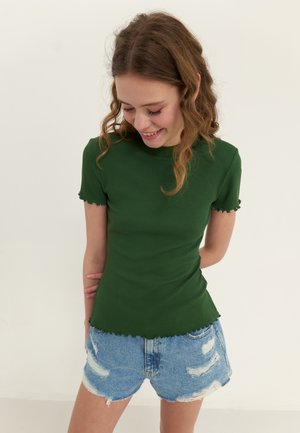 Cache Cache MIT KURZEN ÄRMEN - Camiseta estampada - noir/negro - Zalando.es