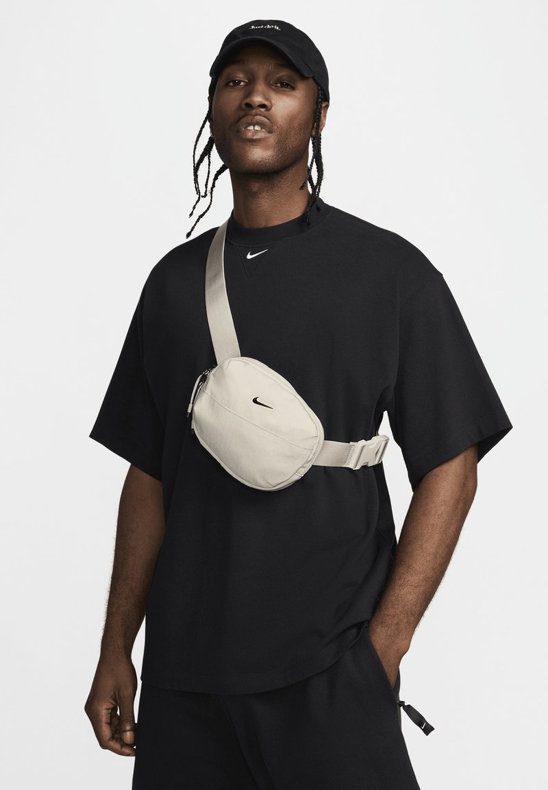 Nike Sportswear AURA WAISTPACK UNISEX - Diržinis krepšelis - light bone ...