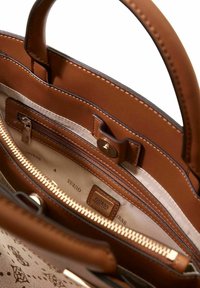 Guess Handbag - latte logo/brown - Zalando