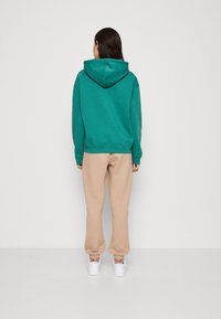 Weekday ESSENCE STANDARD HOODIE - Sweatshirt - green/grün - Zalando.de