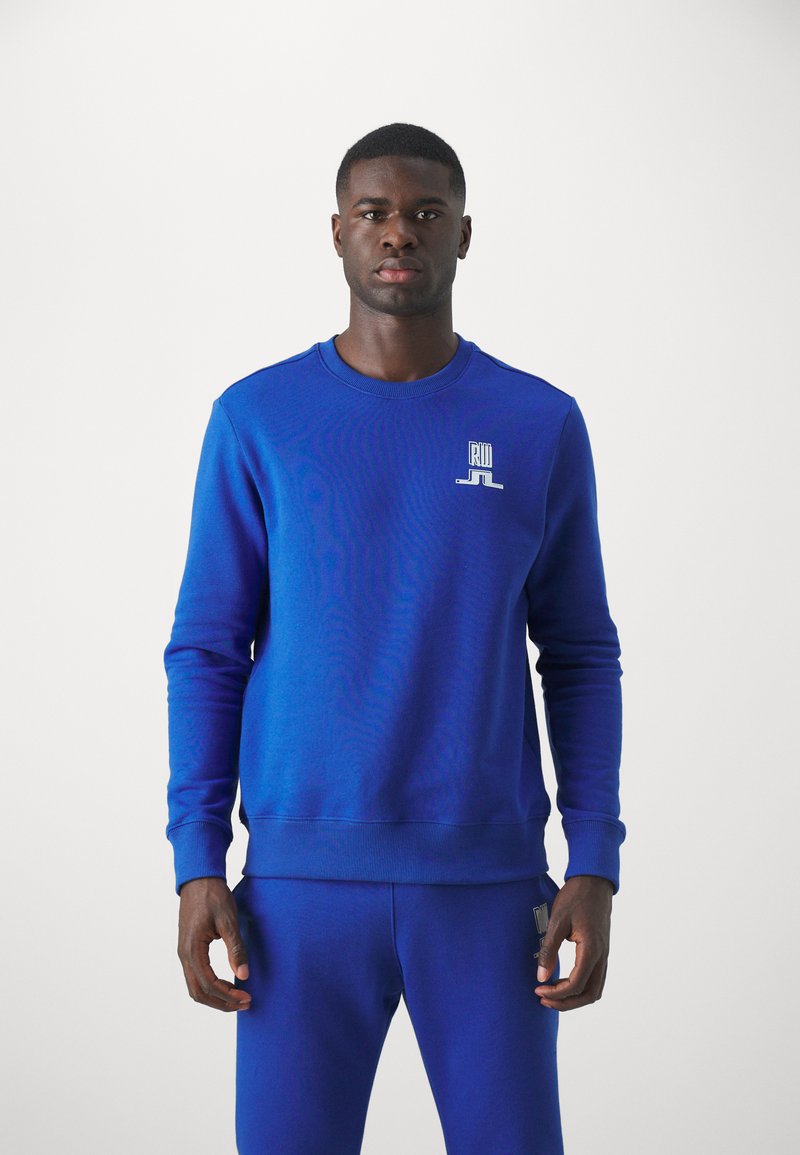 J.LINDEBERG Sports CREW NECK - Sweatshirt - surf the web/blue - Zalando ...