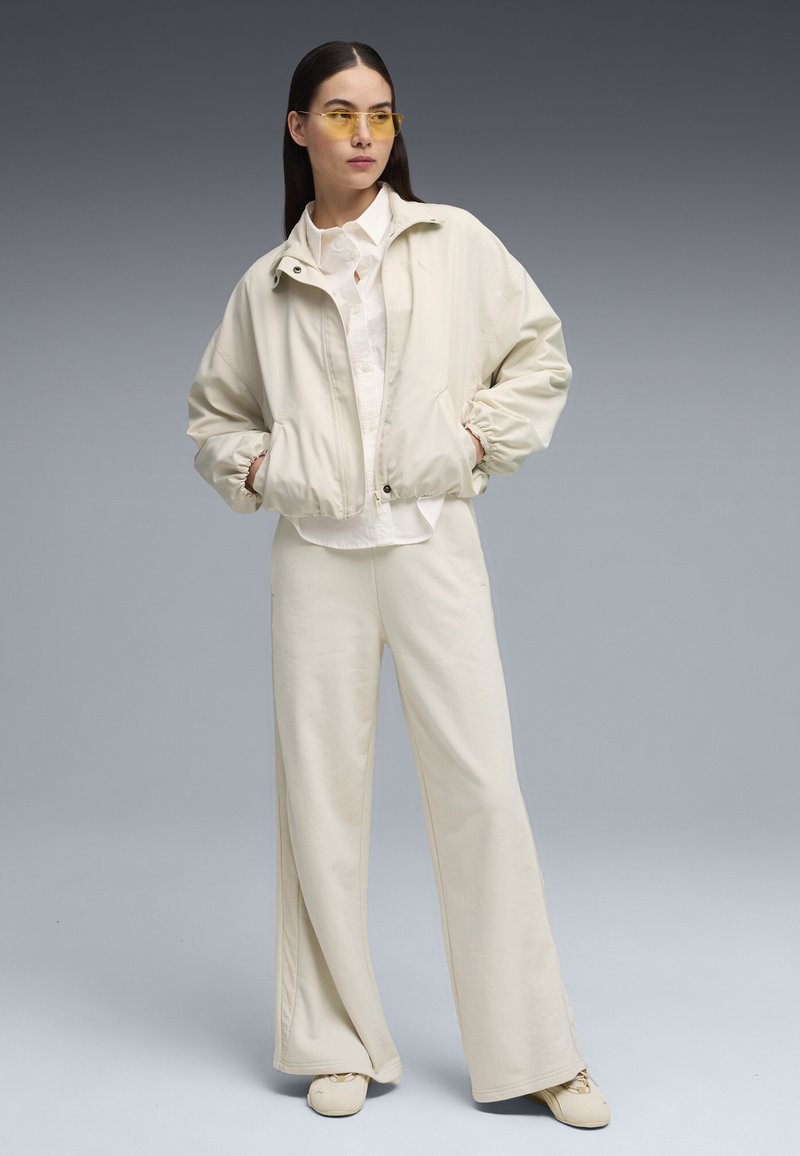 Puma HER HIGH-WAIST WIDE-LEG - Tracksuit bottoms - alpine snow/white ...