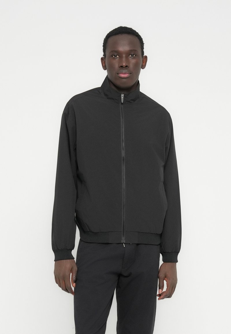 Jack & Jones JJECHARGE STAND COLLAR - Light jacket - black - Zalando