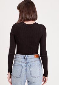 Cache Cache ENG ANLIEGENDER - Jersey de punto - noir/negro - Zalando.es