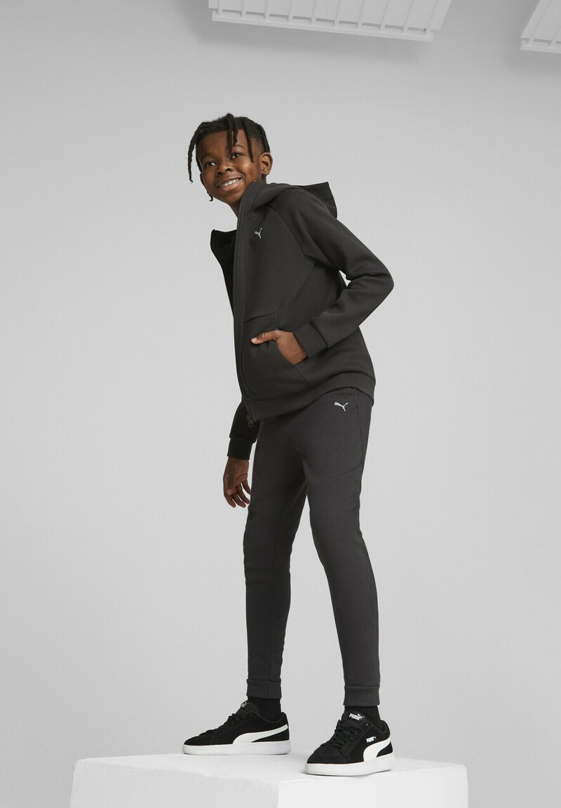 Puma TECH - Pantaloni de trening - black/negru - Zalando.ro