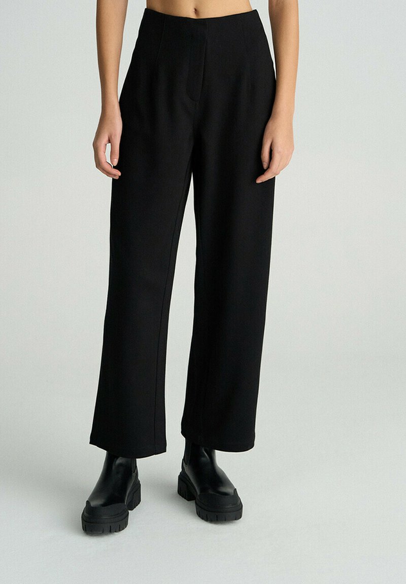 Diverse LALAE - Spodnie materiałowe/czarny - Zalando.pl