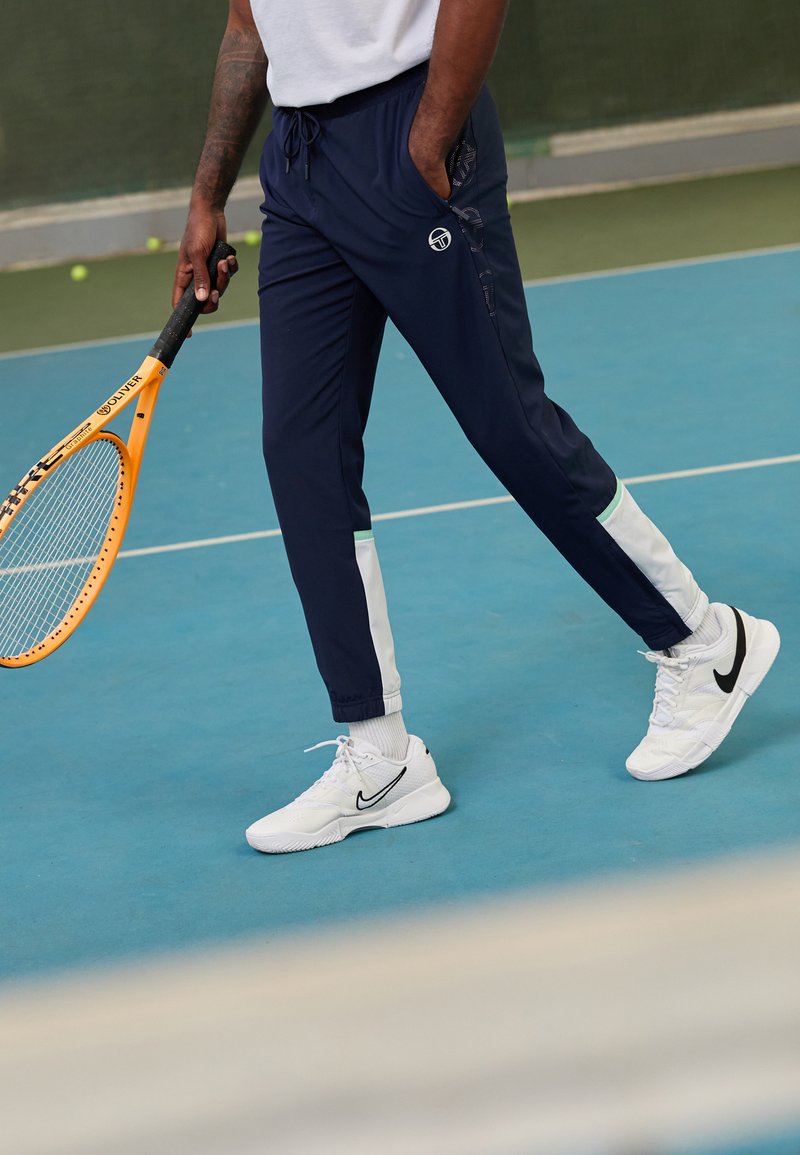 Sergio Tacchini FORATA PANTS - Tracksuit bottoms - navy/cabbage/dark ...