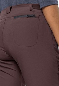Jack Wolfskin GEIGELSTEIN SLIM - Pantalons outdoor - java/marron ...