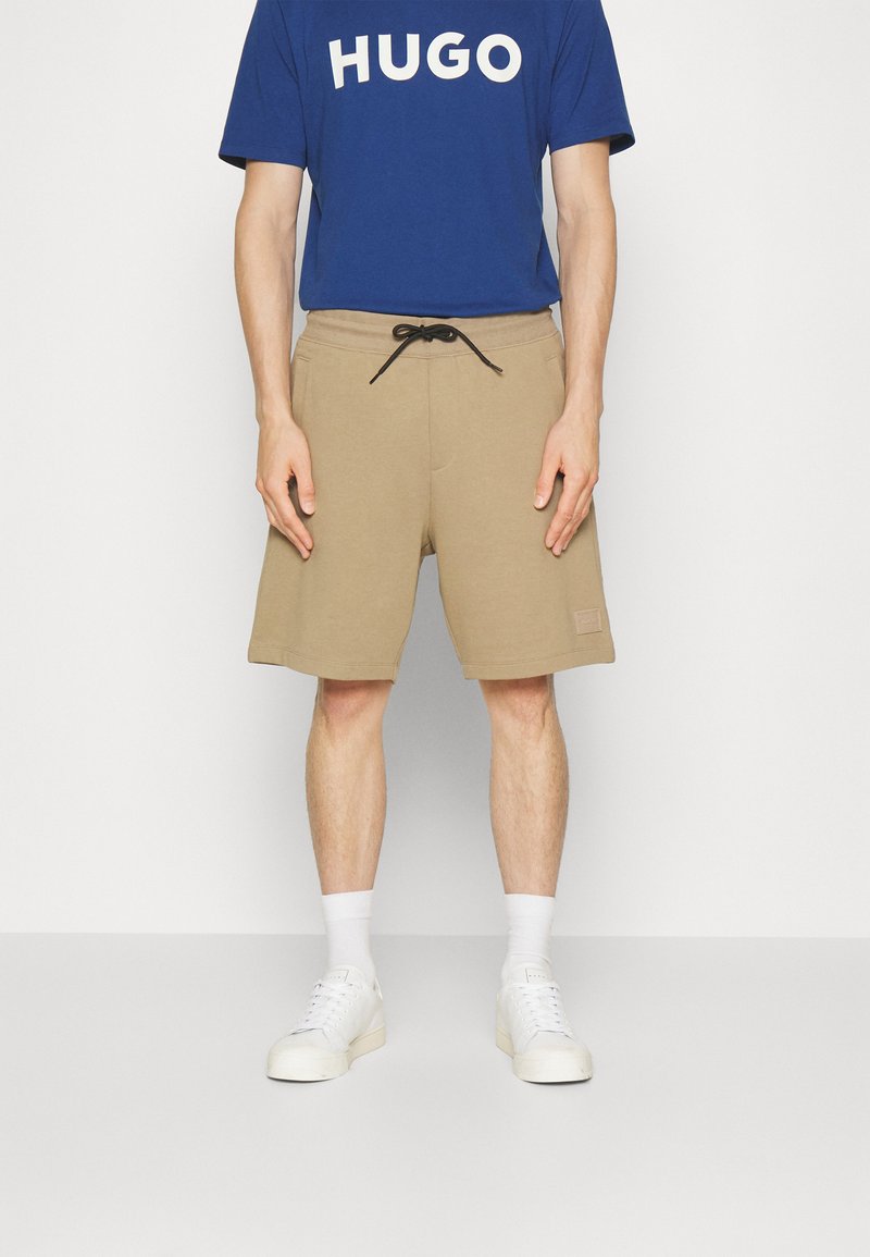 HUGO Teplákové kalhoty - open brown/béžová - Zalando.cz